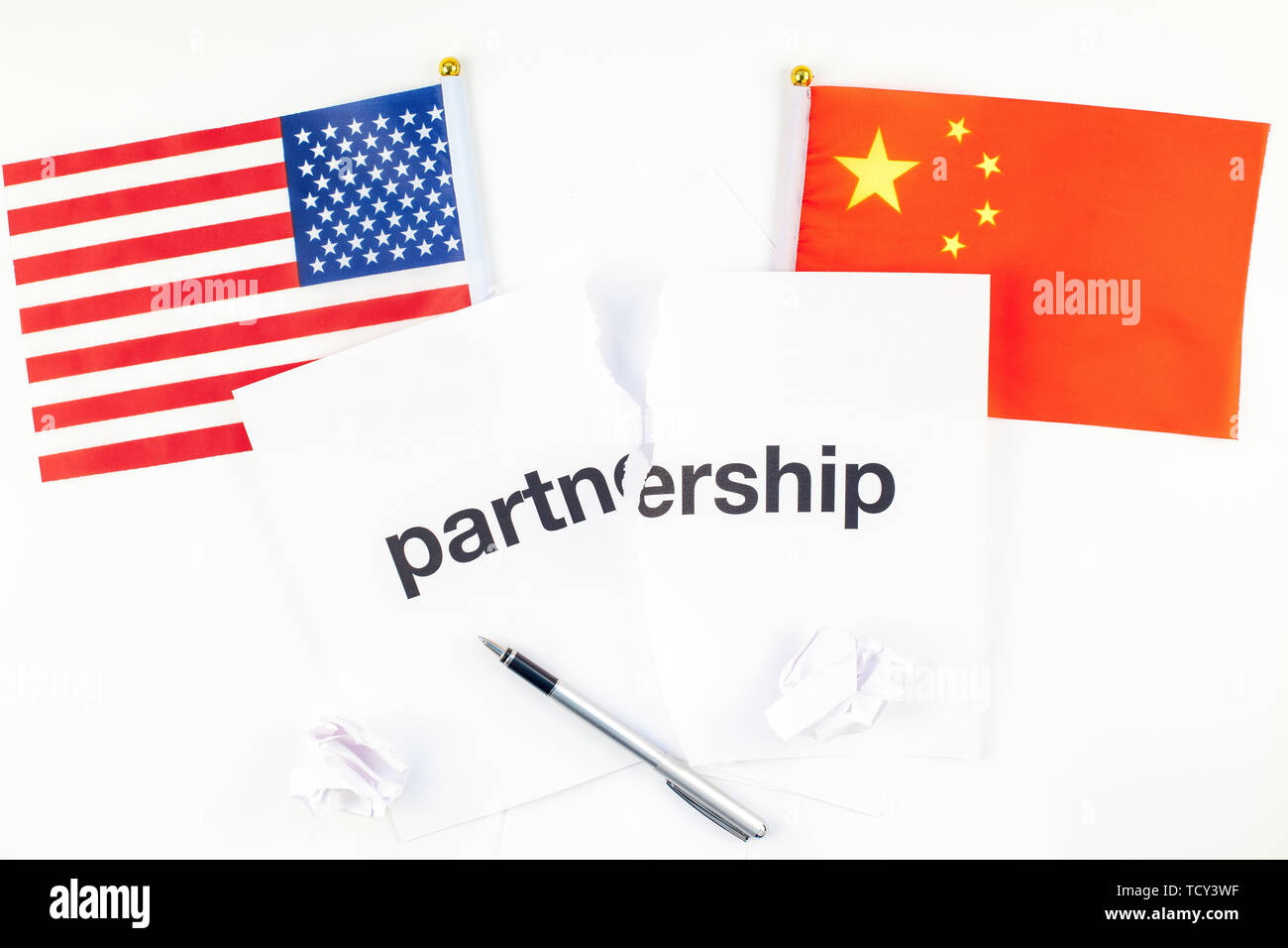 Creative top view flat lay of China and USA flag and broken partnership ...