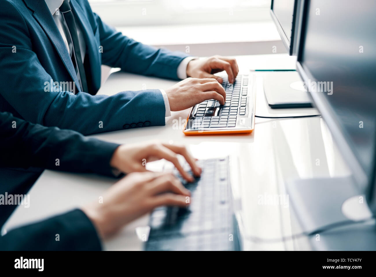Business people working on laptop. People hands typing on laptop ...