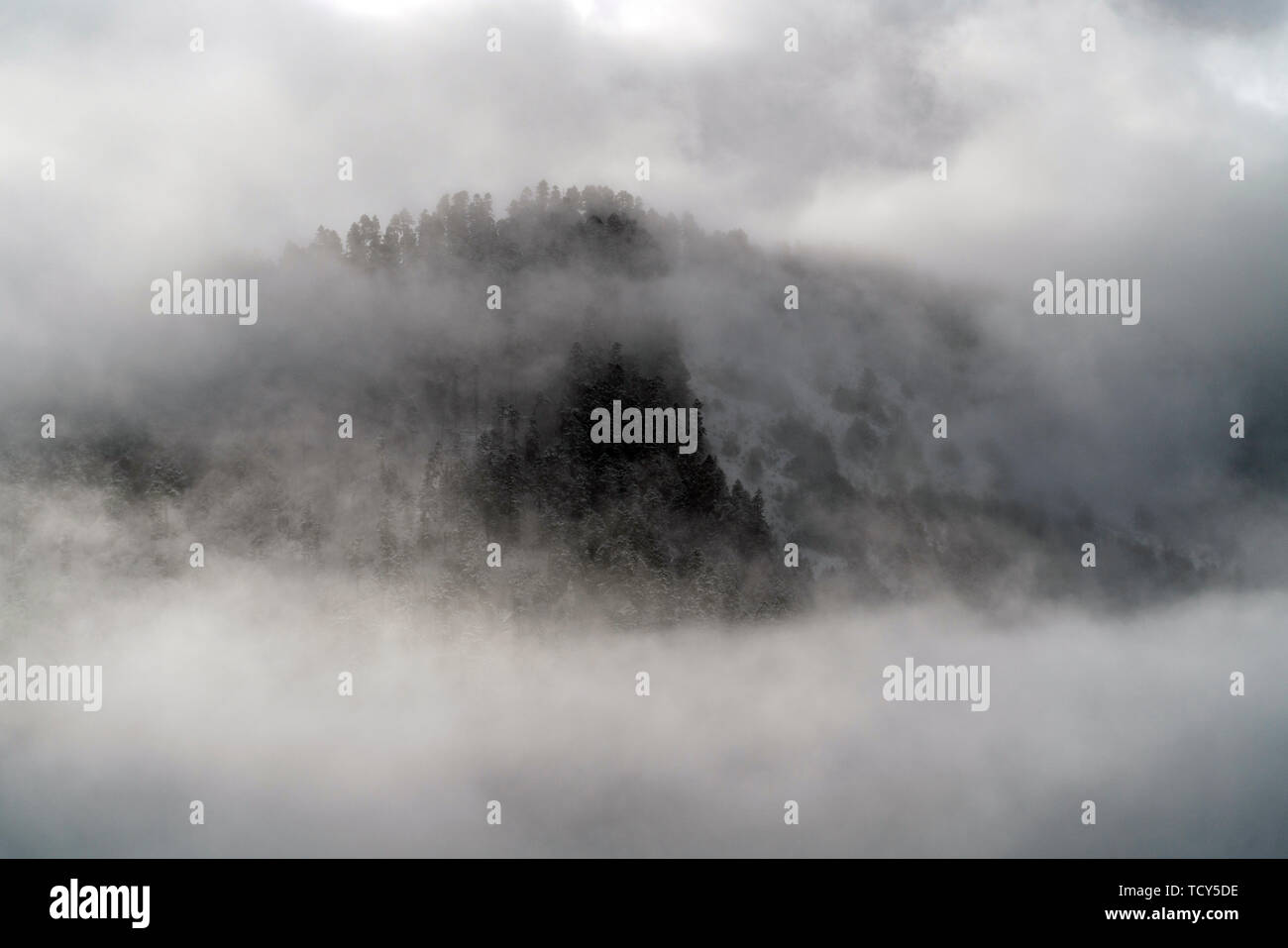 Snow mountain clouds and fog Stock Photo - Alamy