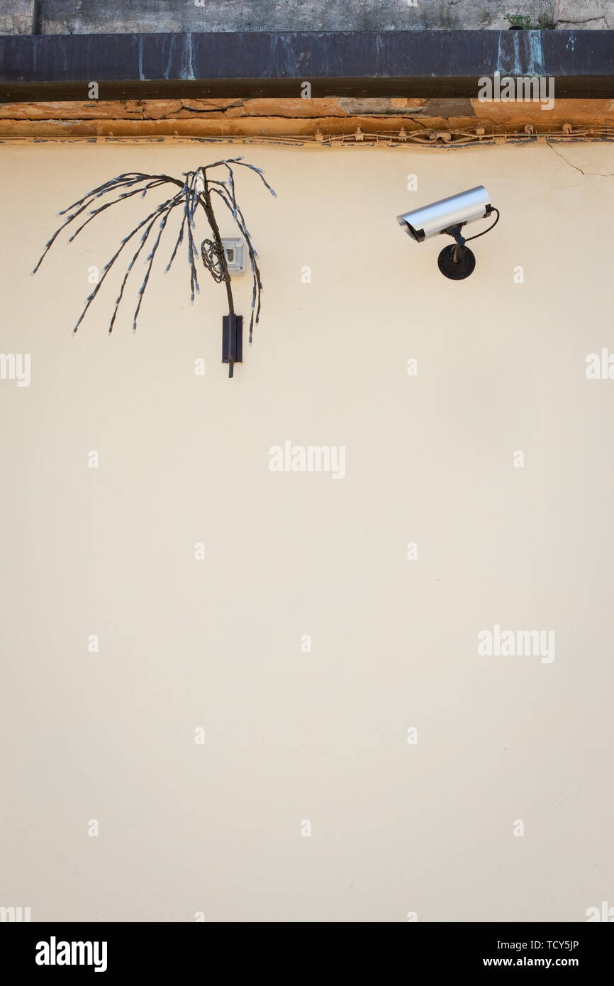 An old and new security camera photographed on a wall Stock Photo - Alamy