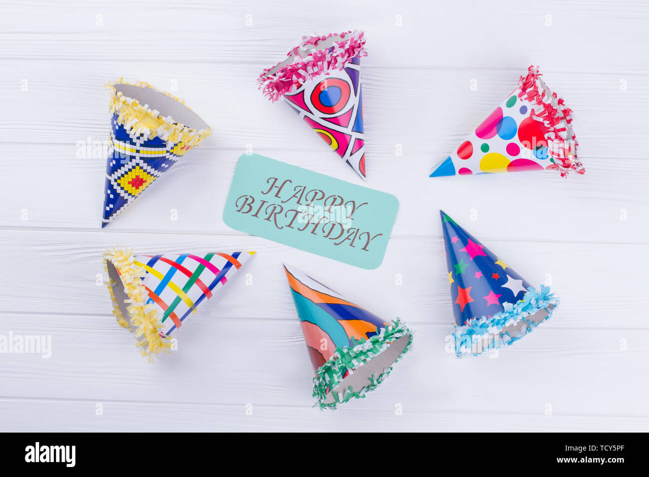 Happy Birthday card and party hats Stock Photo - Alamy