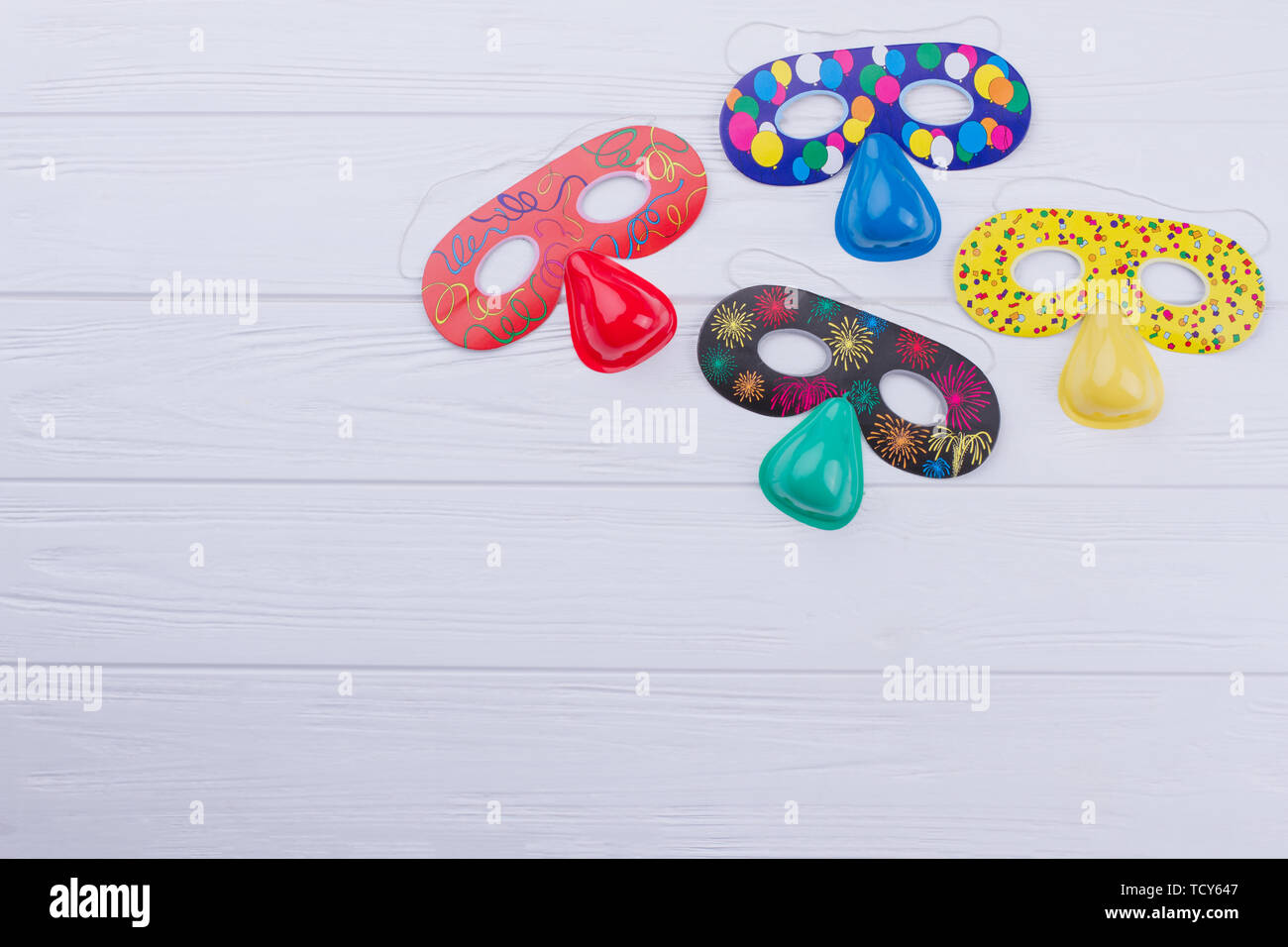 Four different masks for kids Birthday party Stock Photo - Alamy