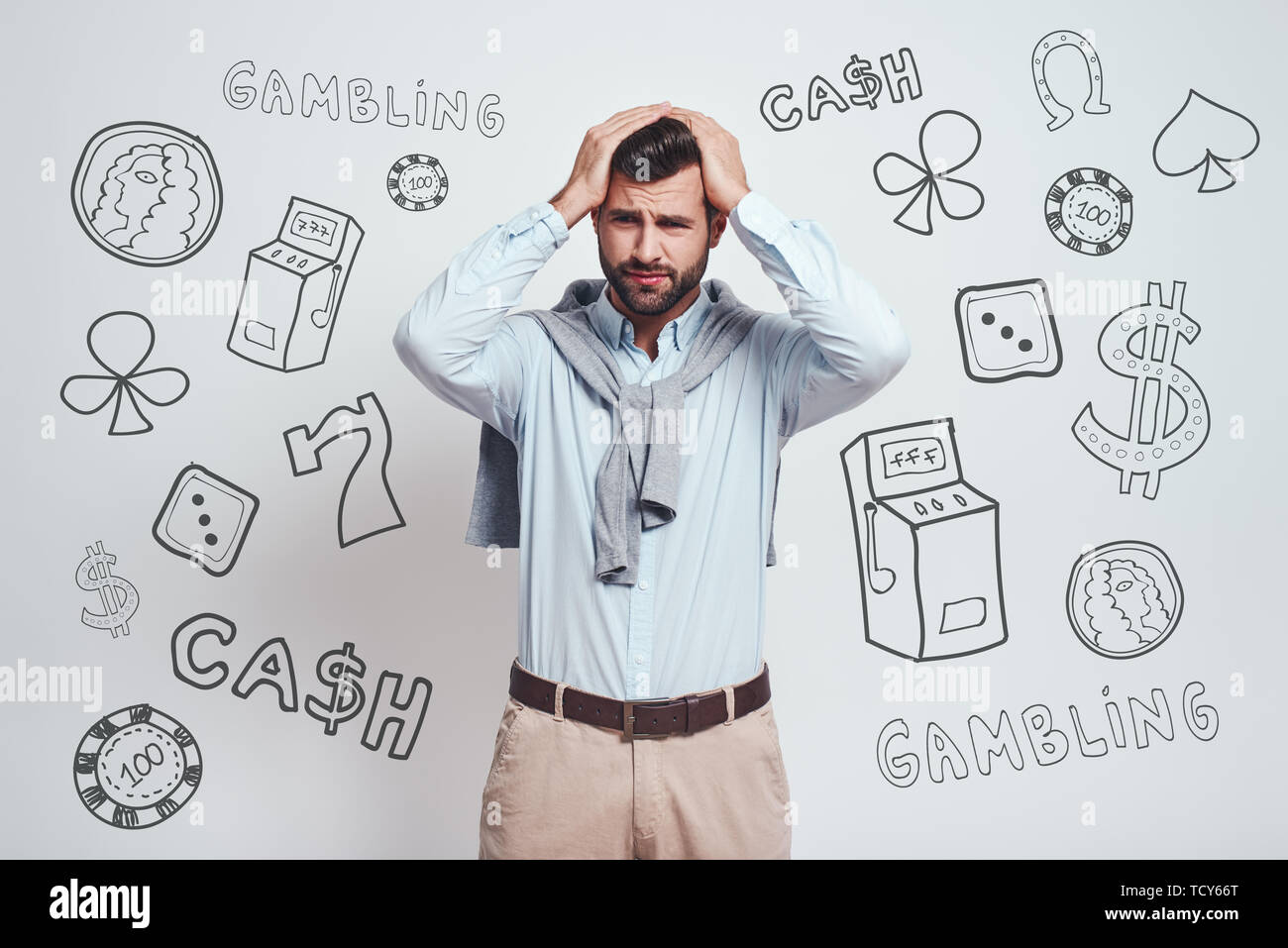 Game over. Close-up portrait of depressed young man keeping head in his ...