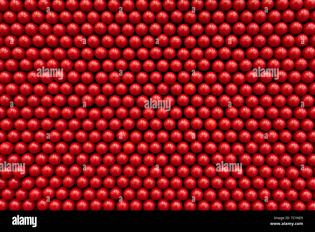 Abstract dots background in red colors. Red is the color of fire and ...