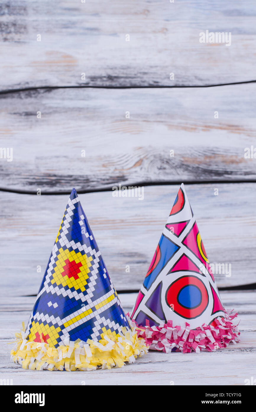 Paper hats for kids costume party Stock Photo - Alamy