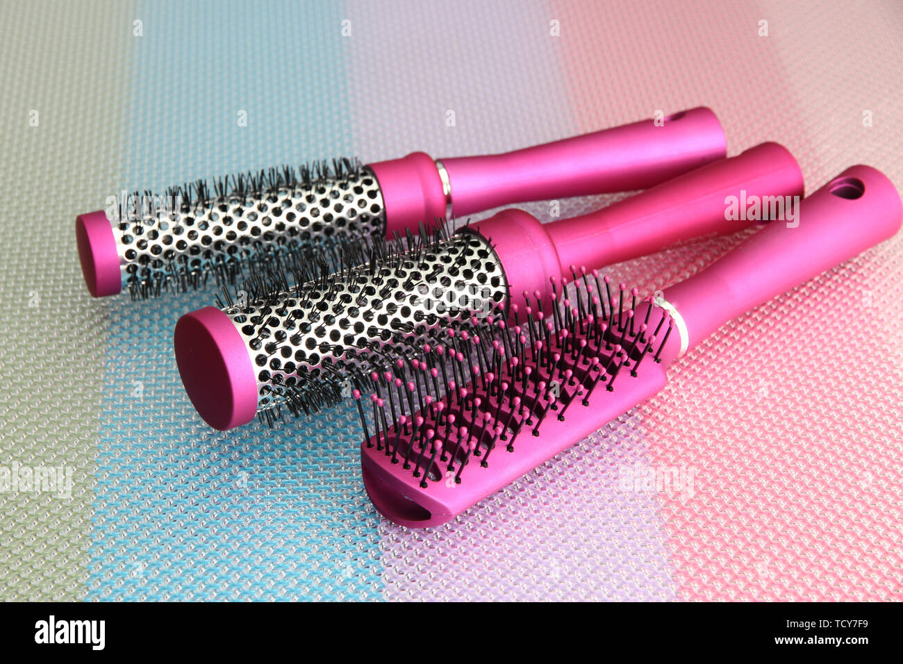 Three hairbrushes background hi-res stock photography and images - Alamy