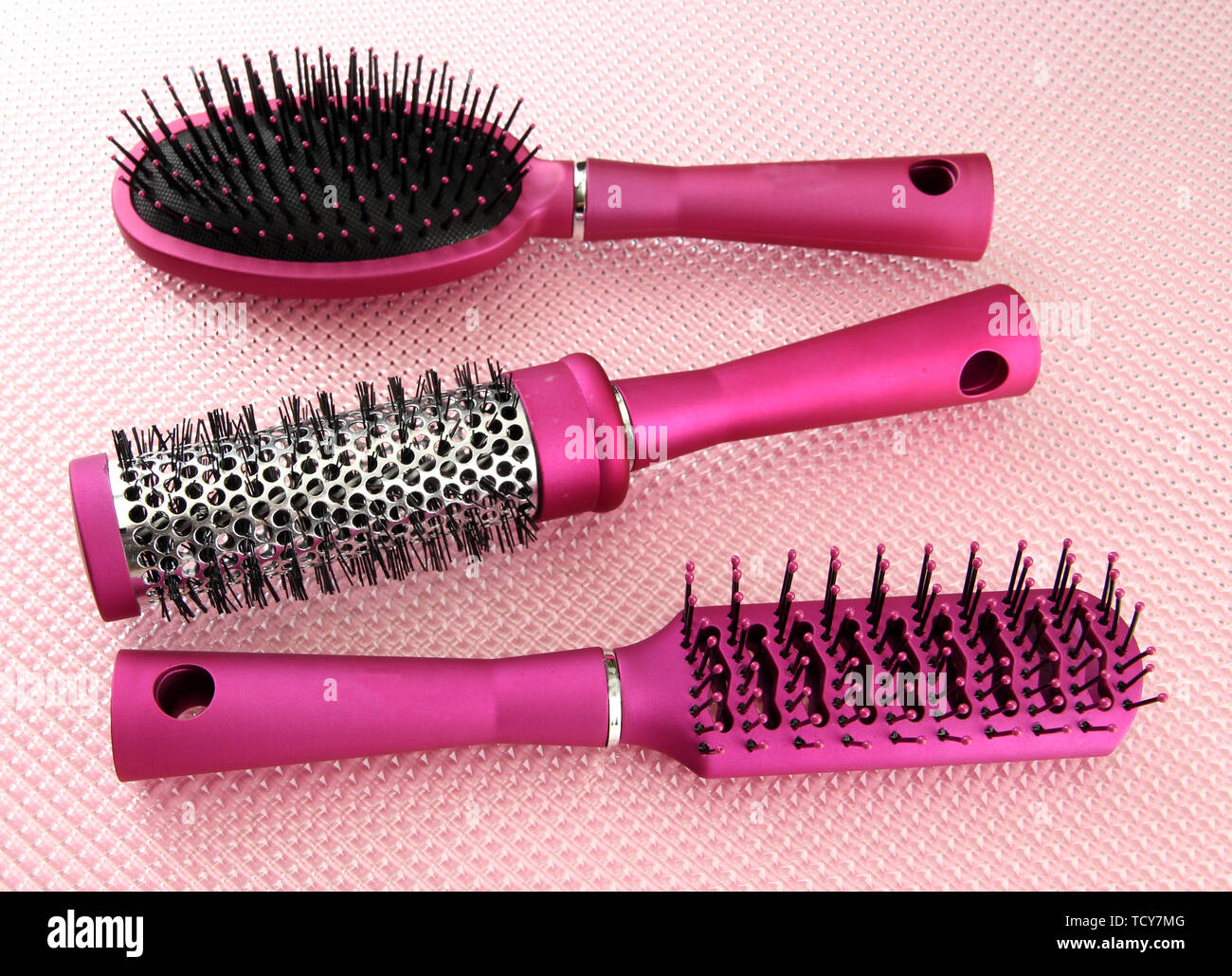 Three hairbrushes background hi-res stock photography and images - Alamy