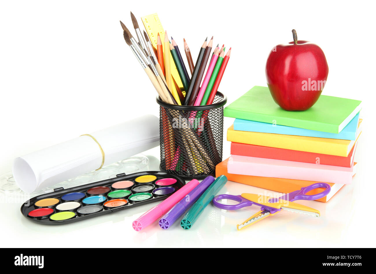 School supplies, books and apple isolated on white Stock Photo - Alamy