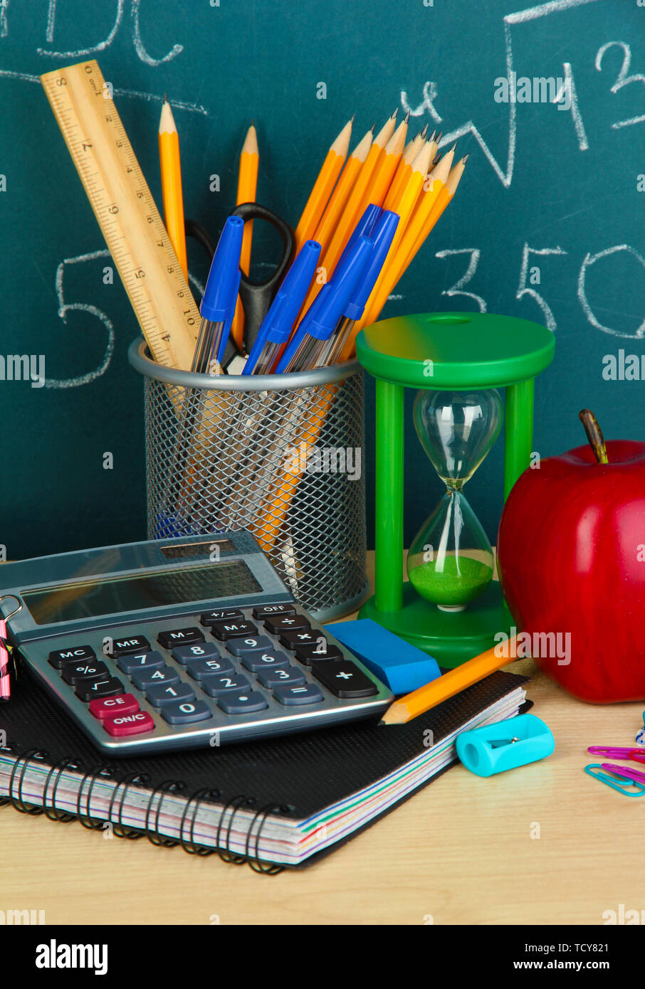 School supplies on wooden table Stock Photo - Alamy
