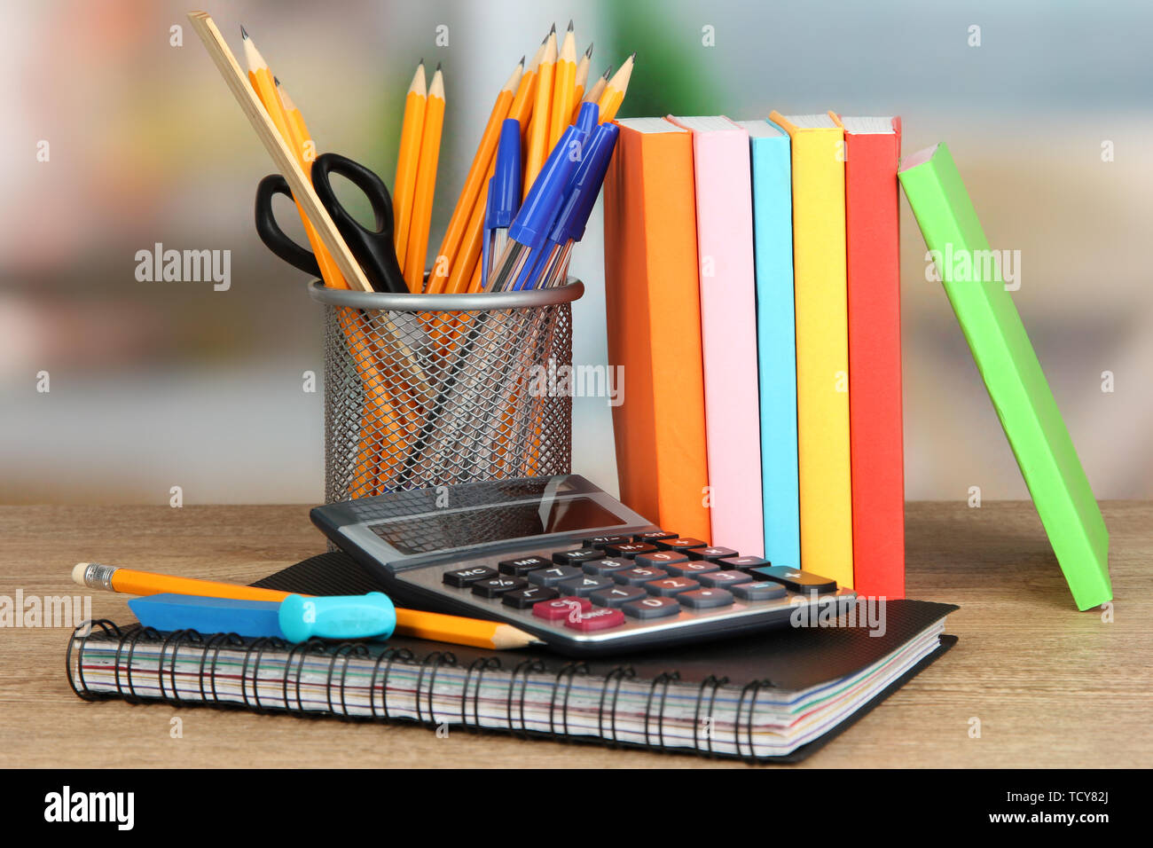 School supplies on wooden table Stock Photo - Alamy