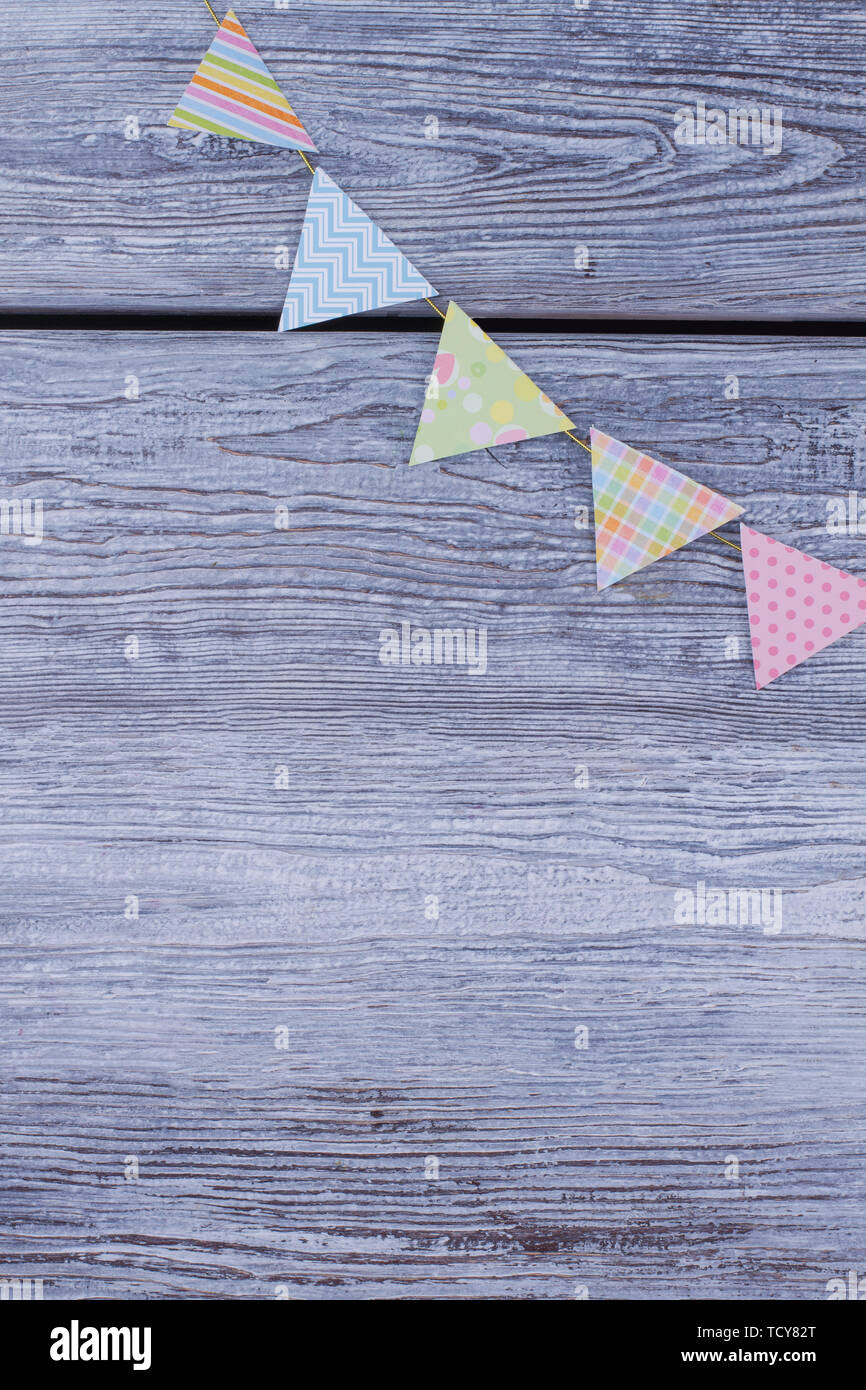 Colorful triangle DIY party flags on rope Stock Photo - Alamy