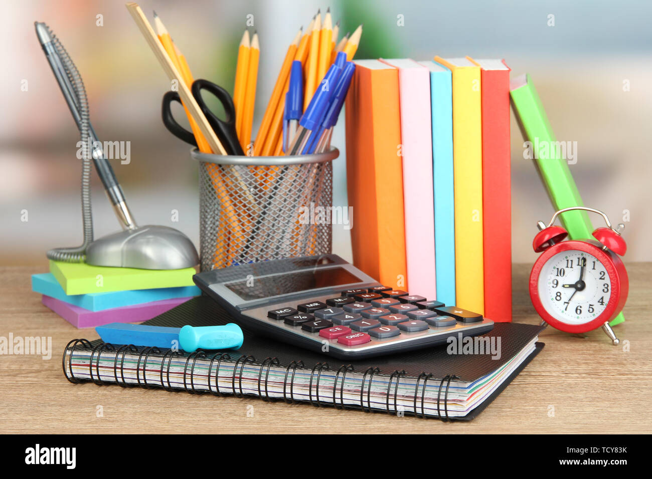 School supplies on wooden table Stock Photo - Alamy