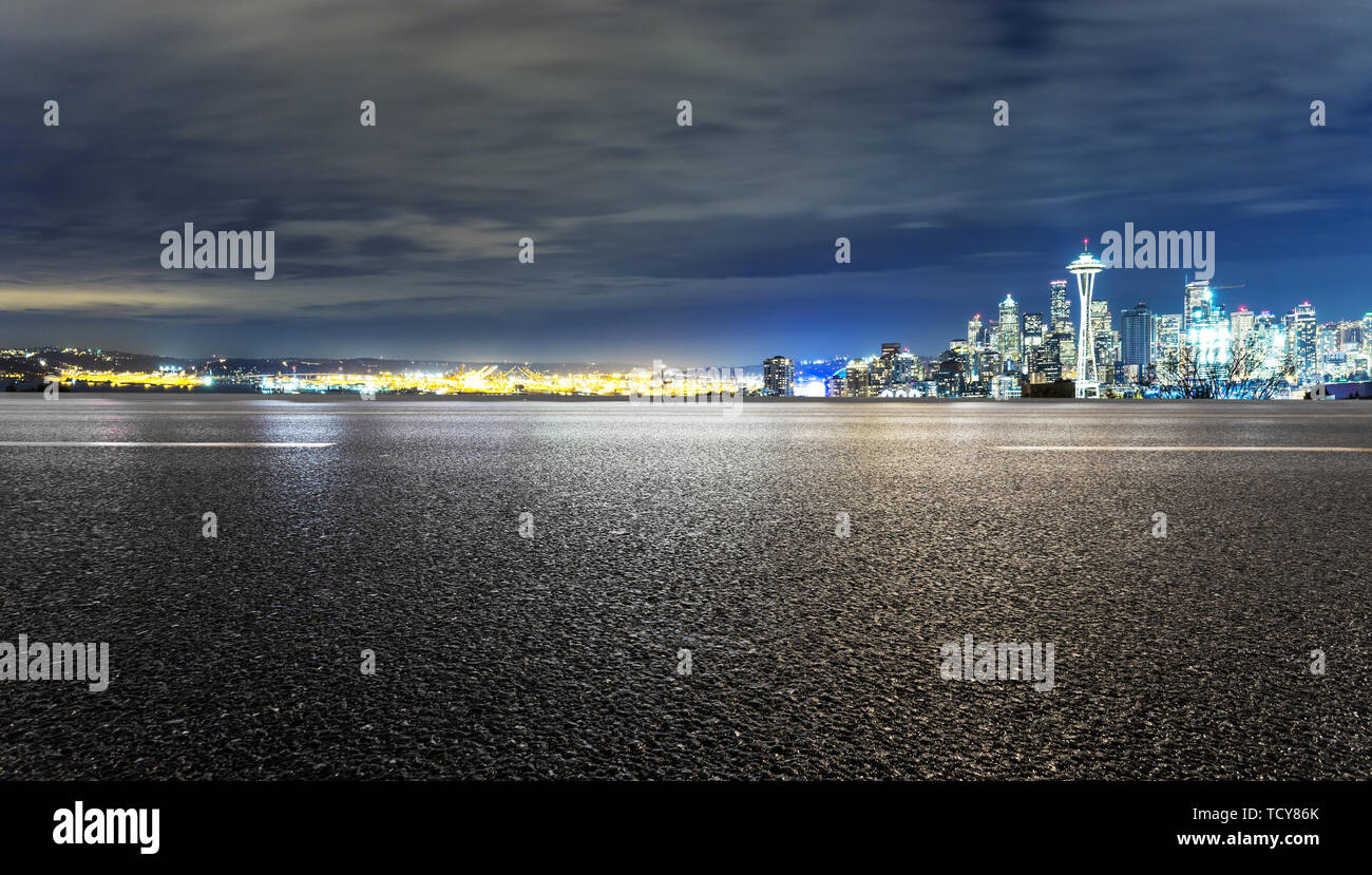 asphalt road with cityscape of seattle at night Stock Photo - Alamy