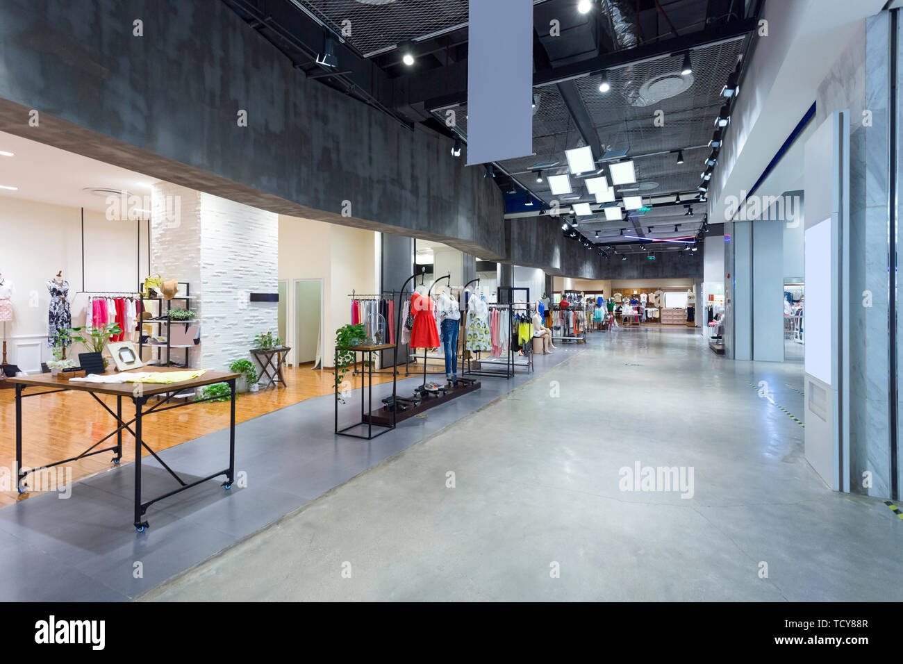 mannequins in fashion shop display window Stock Photo - Alamy