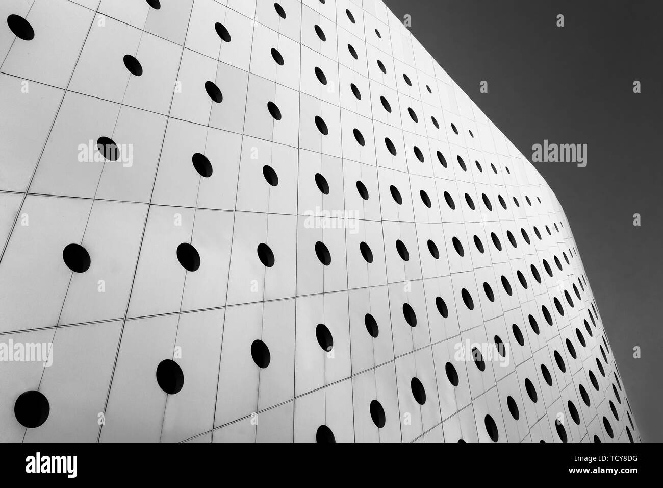 Geometry of the exterior walls of minimalist buildings Stock Photo - Alamy