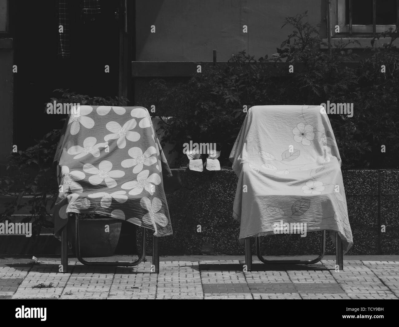 The sheets hanging on the chair Stock Photo - Alamy