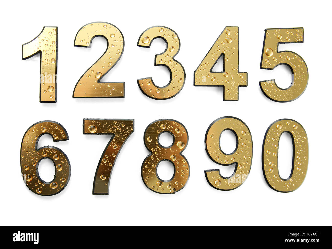 Golden numbers with drops, isolated on white Stock Photo - Alamy
