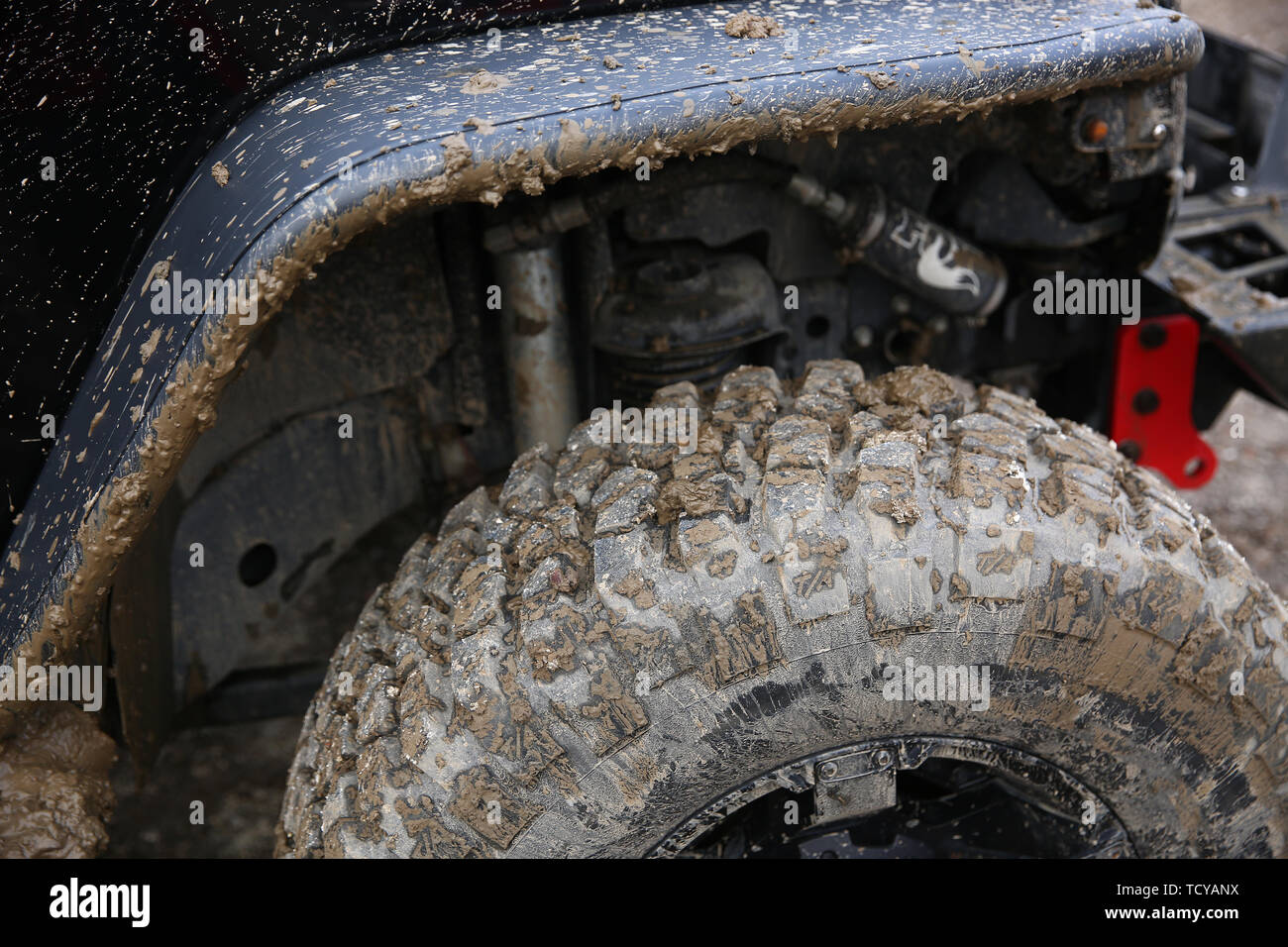Muddy car tires Stock Photo - Alamy