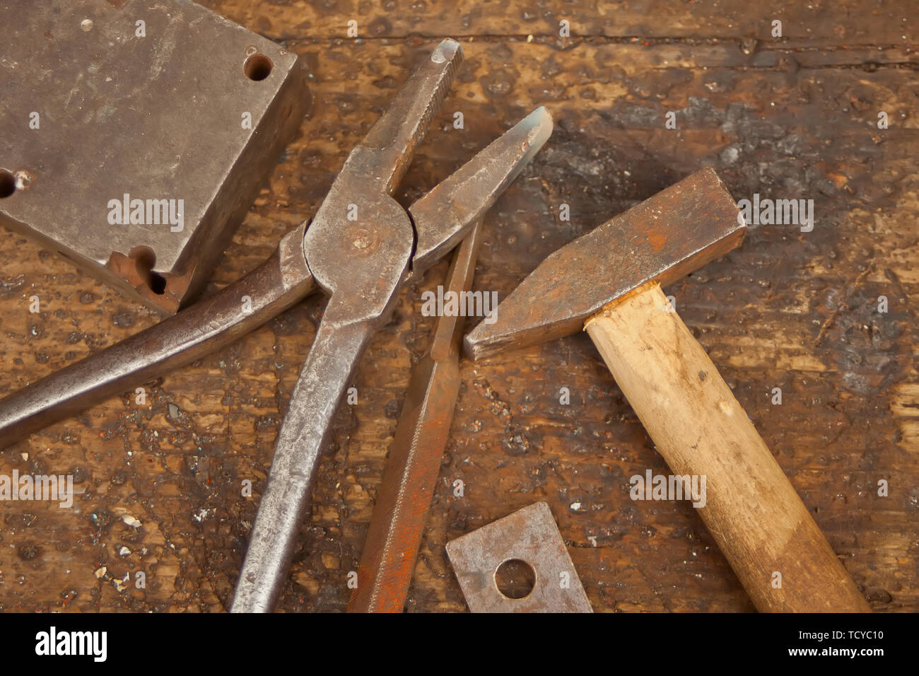 Collection of vintage carpentry tools on an old workbench: woodworking ...