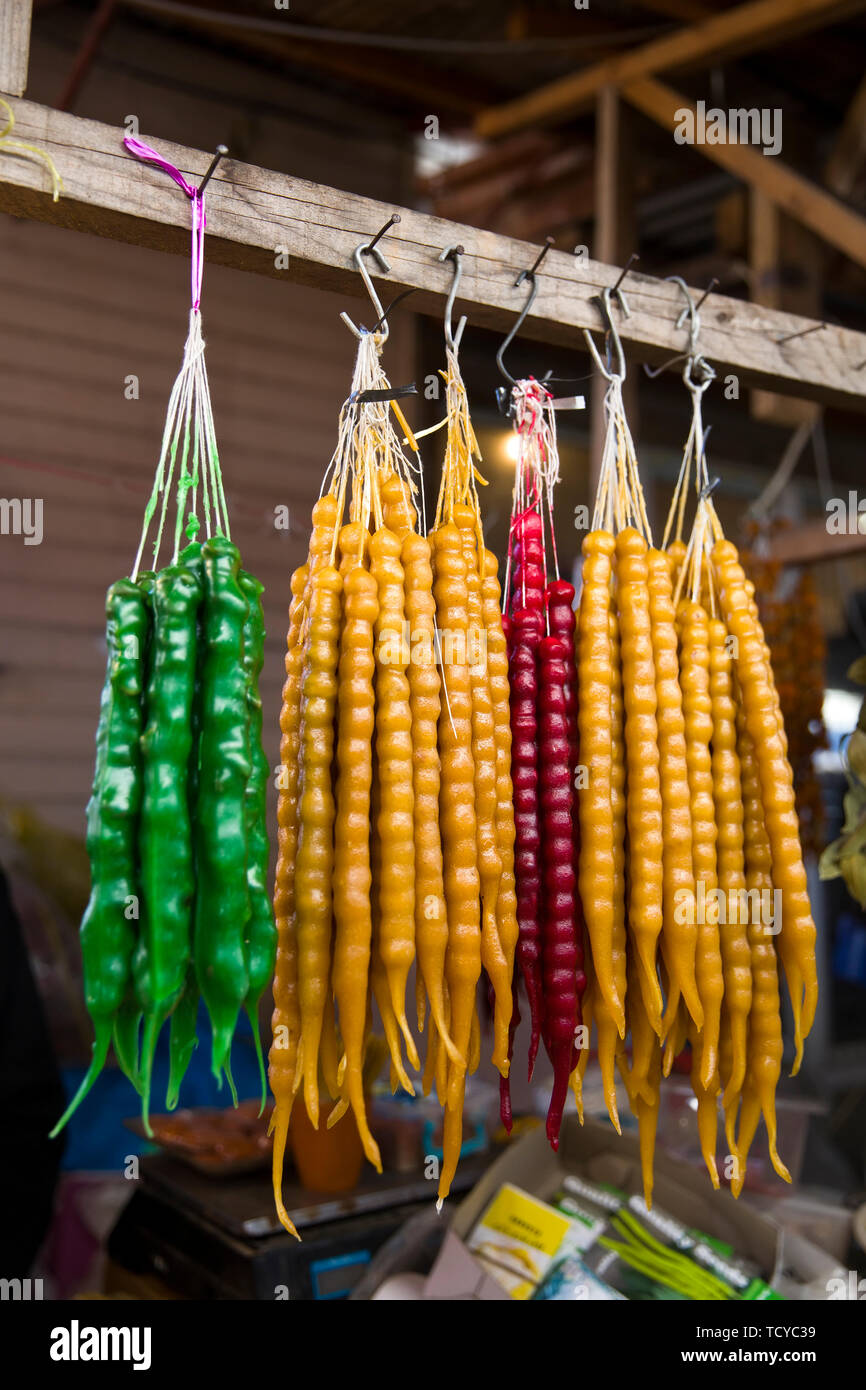 View at colorful churchkhela, traditional Georgian candle-shaped candy ...
