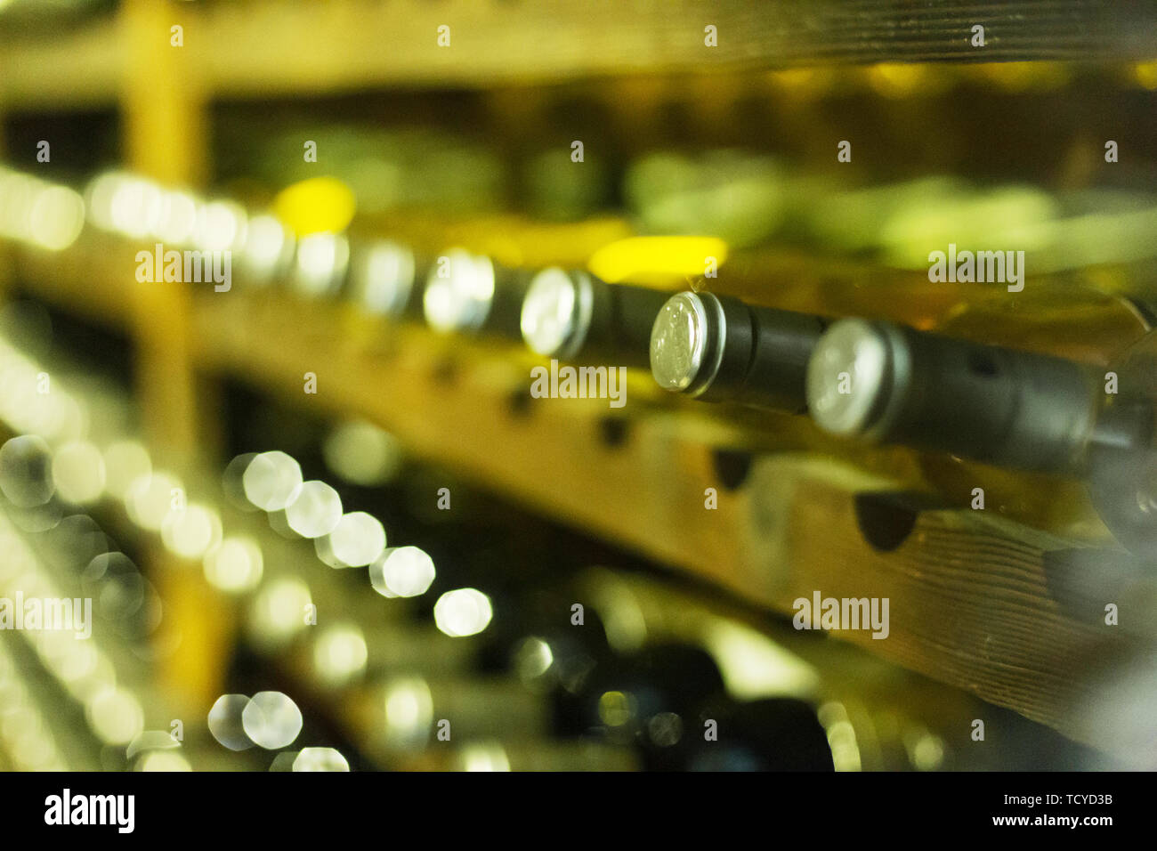 Wine cellar full of wine bottles Stock Photo - Alamy