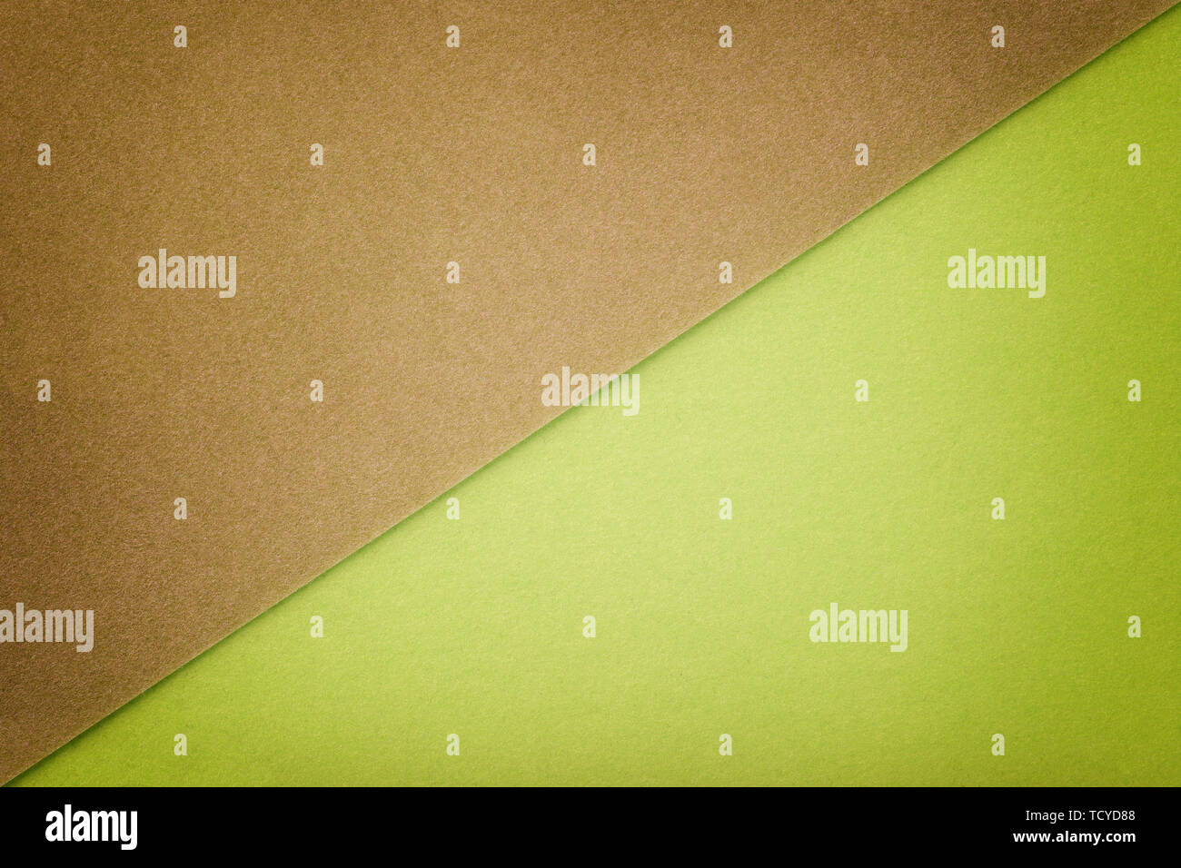 Two color background brown and green shade. Colorful paper divided in ...