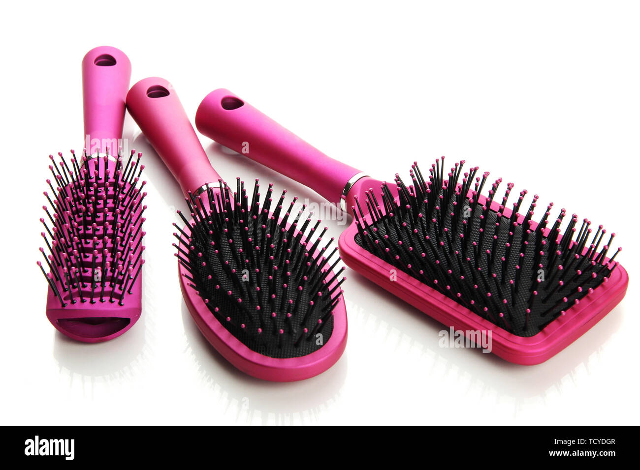 Comb brushes, isolated on white Stock Photo - Alamy