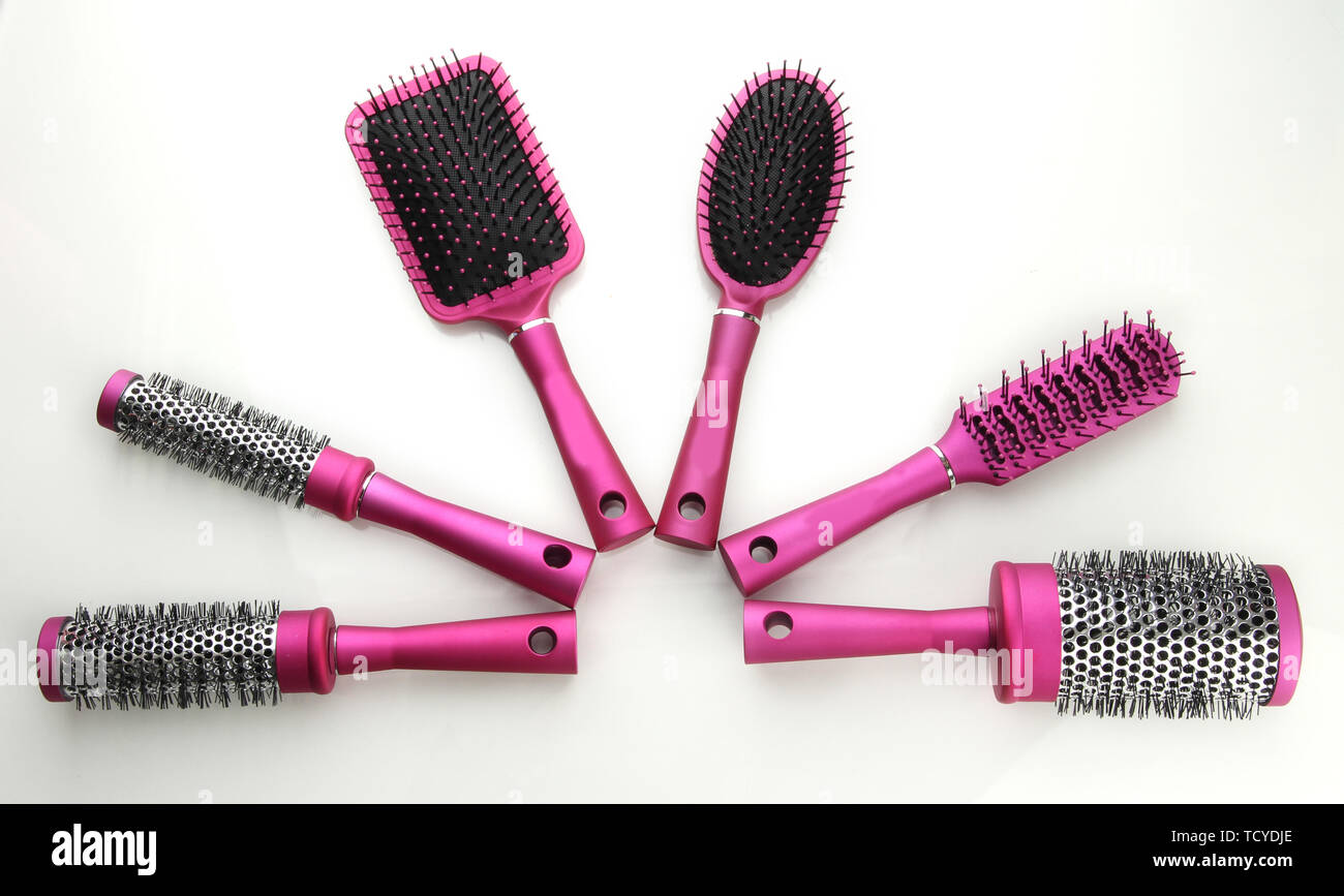 Comb brushes, isolated on white Stock Photo - Alamy
