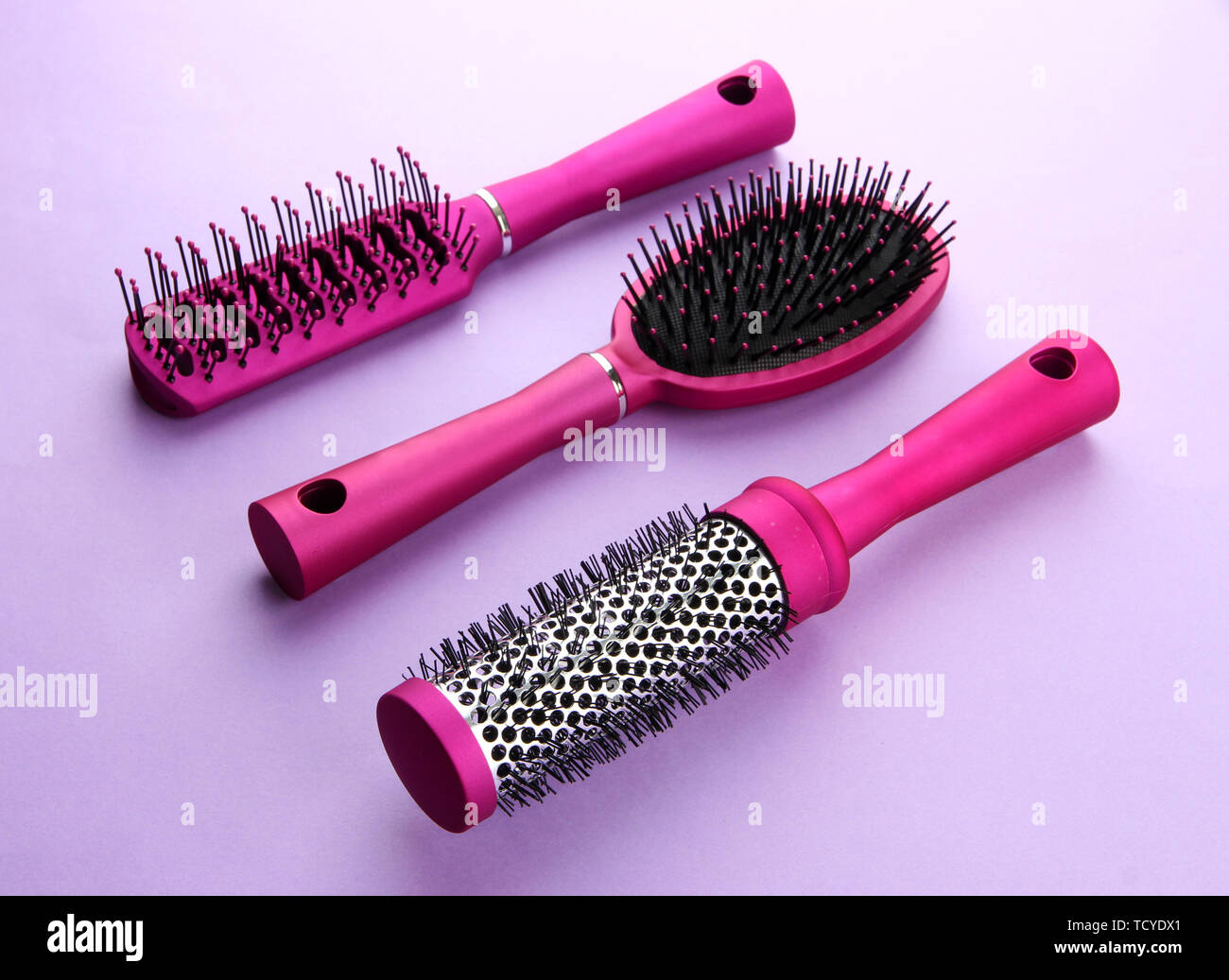 Three hairbrushes background hi-res stock photography and images - Alamy