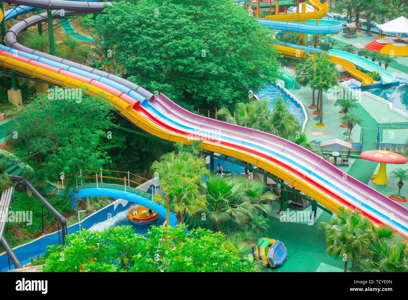 Summer water park, all kinds of slides Stock Photo - Alamy