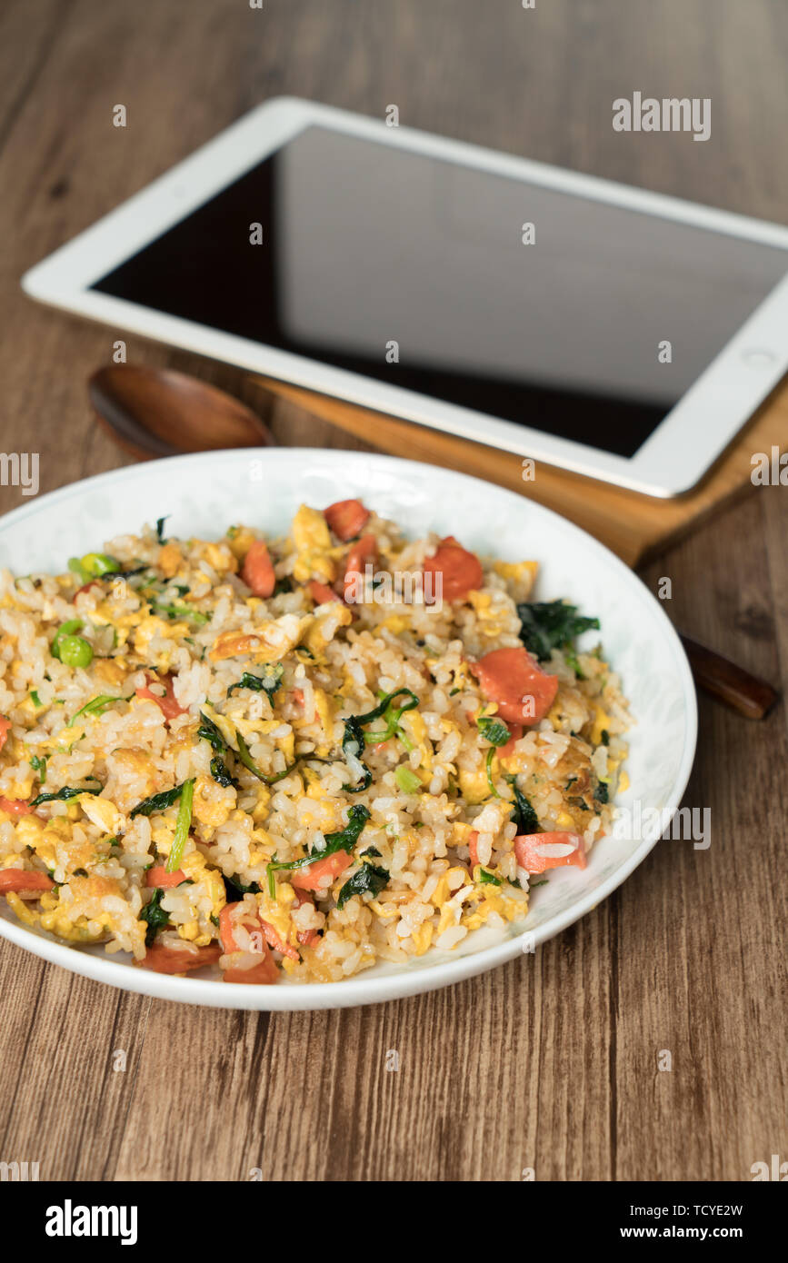Egg fried rice with computer screen Stock Photo - Alamy
