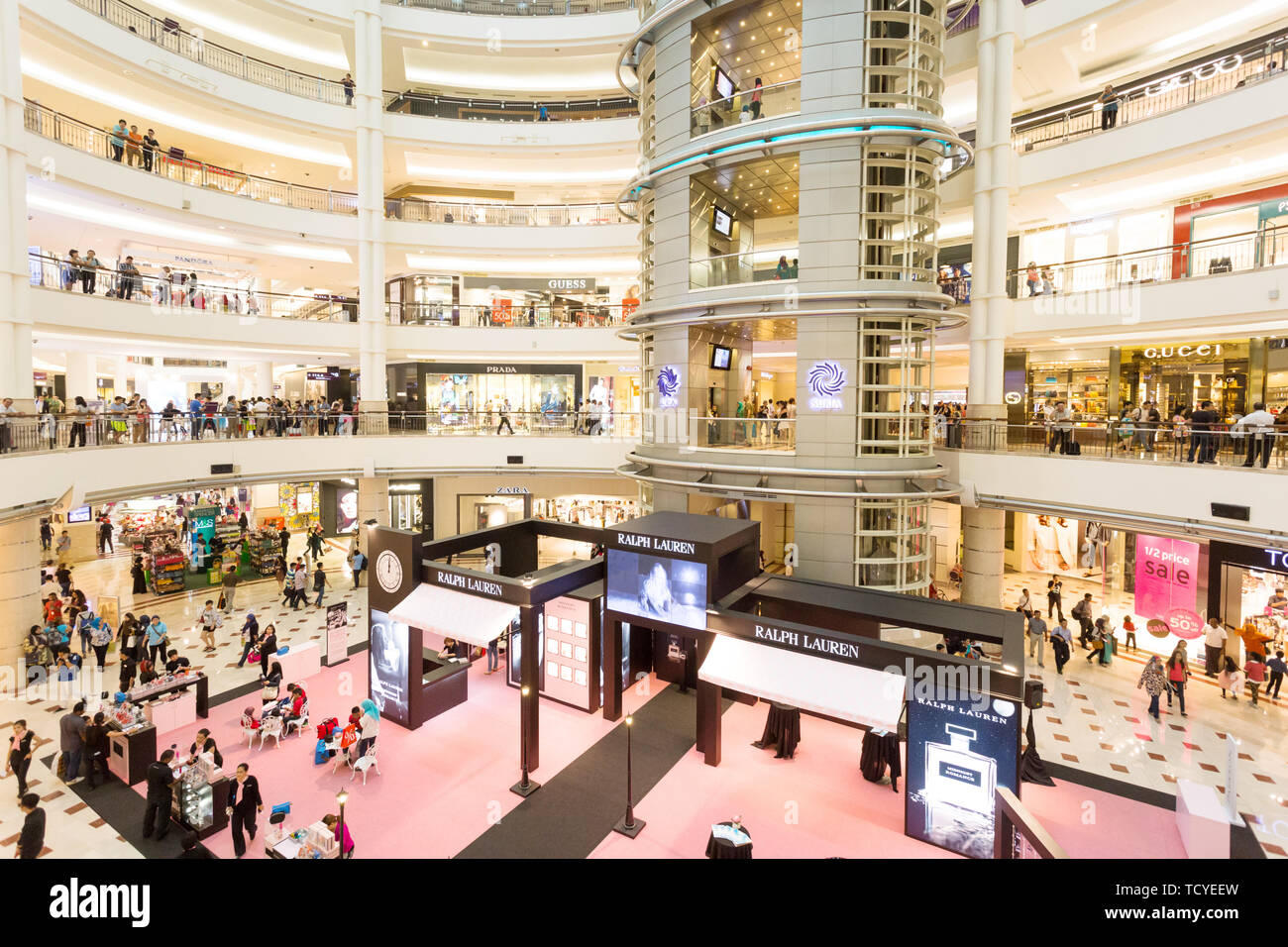 People busy shopping at mall Stock Photo - Alamy