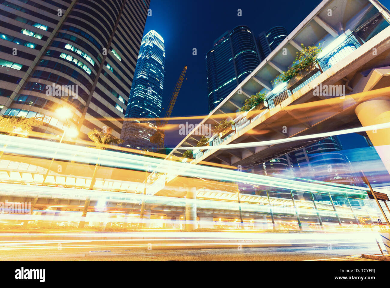 traffic light trails in modern city at night Stock Photo - Alamy