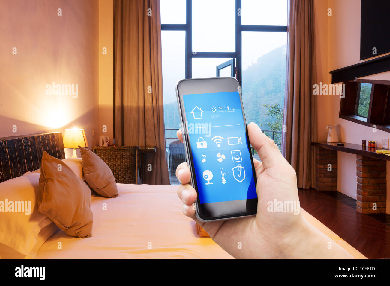 smart phone with smart home with modern bedroom Stock Photo - Alamy