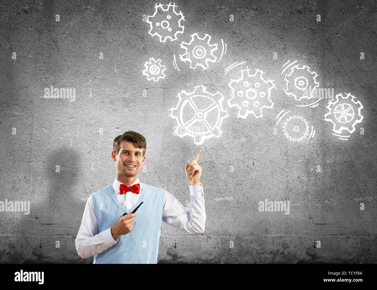 Elegant banker wearing red tie and gears as teamwork concept Stock ...