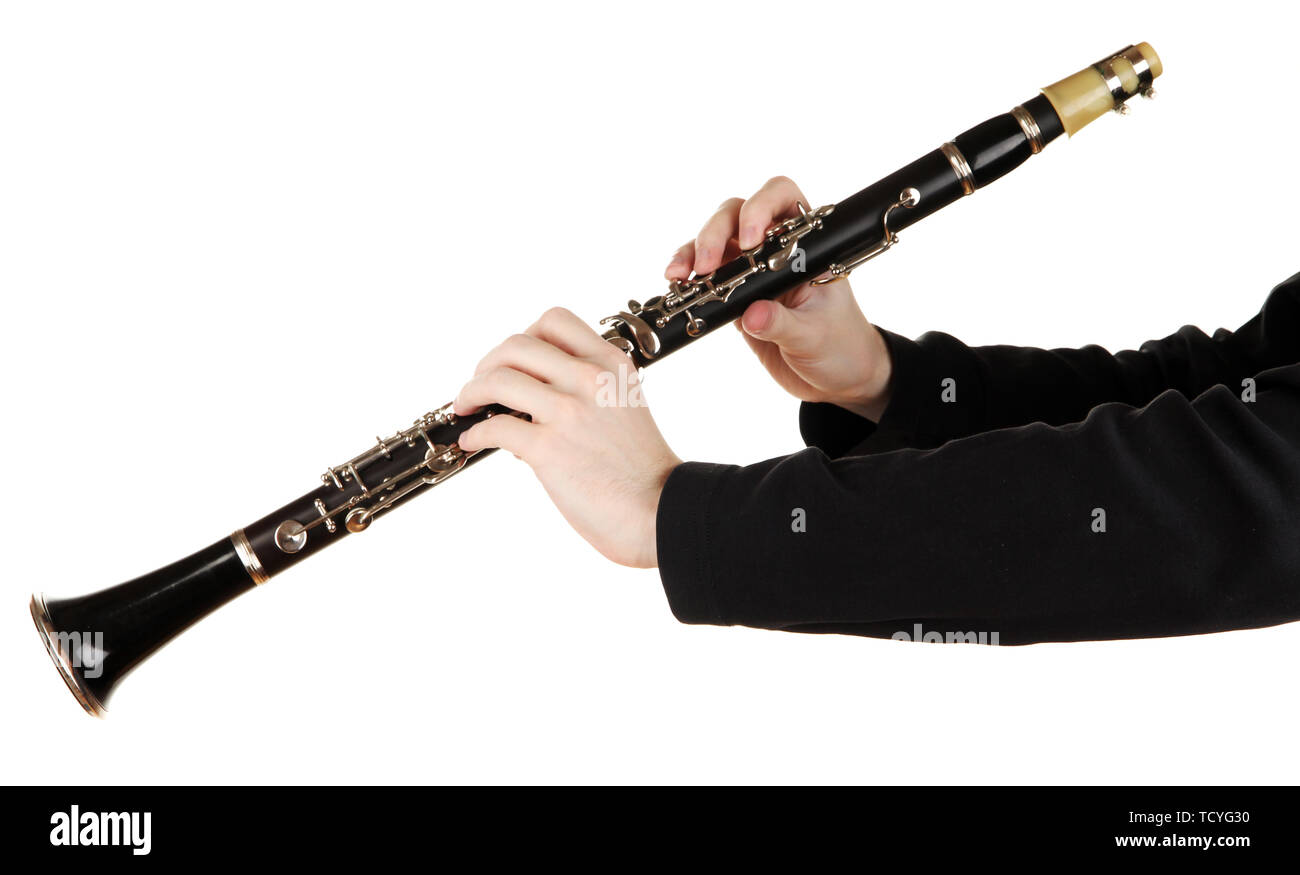 Musician playing on clarinet isolated on white Stock Photo - Alamy