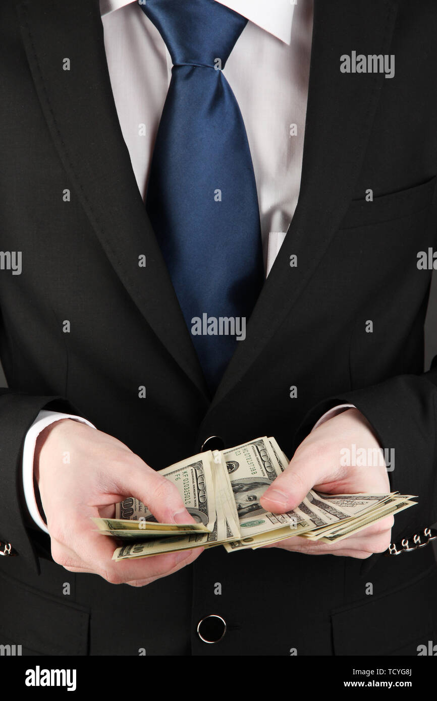 Business man counts money close-up Stock Photo - Alamy