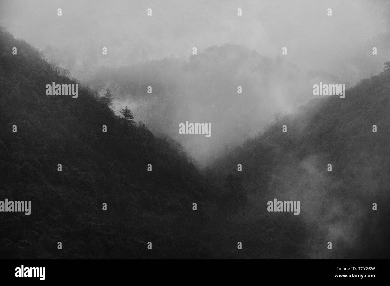 Mountain shadow mist Stock Photo - Alamy