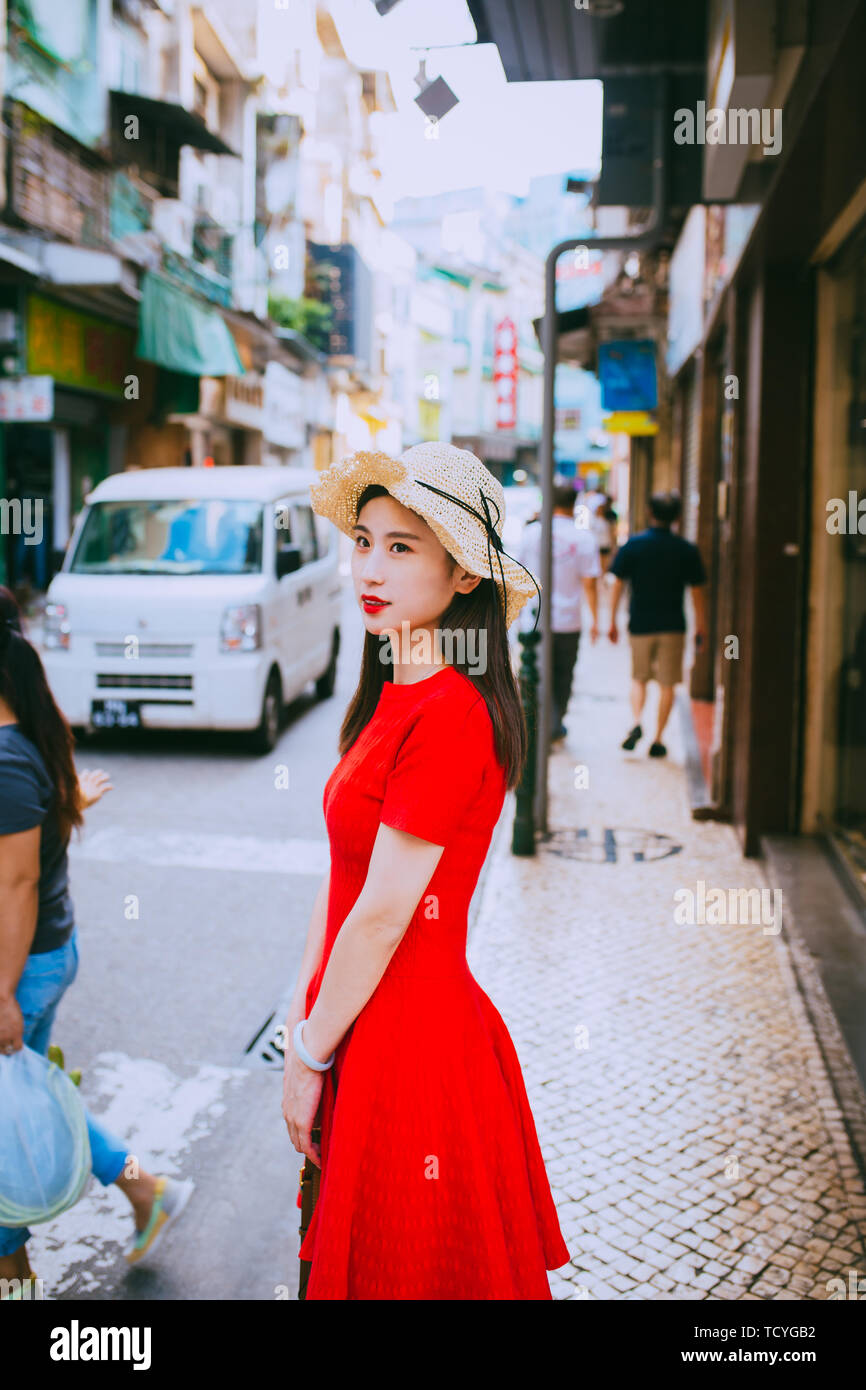 Red dress to Macau Stock Photo - Alamy