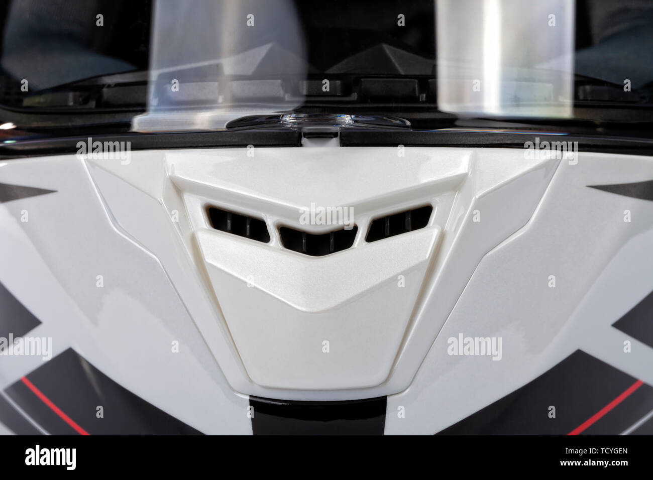 Detail of the front air intake of a white helmet full face of ...