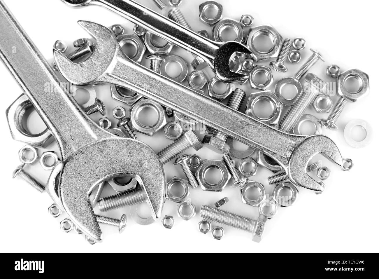 Wrenches on bolts, screws and nuts isolated on white Stock Photo - Alamy