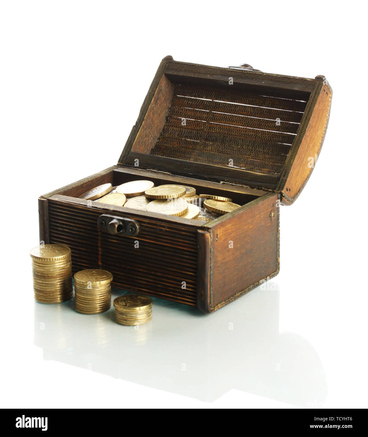 Coins in chest isolated on white Stock Photo - Alamy