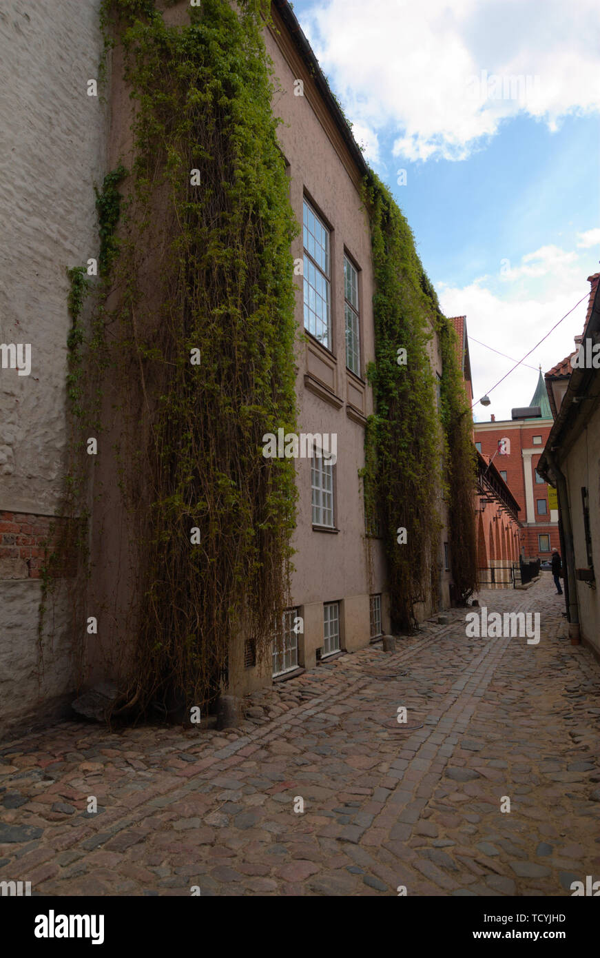 Narrow street in the old town, Riga, Lativa Stock Photo - Alamy
