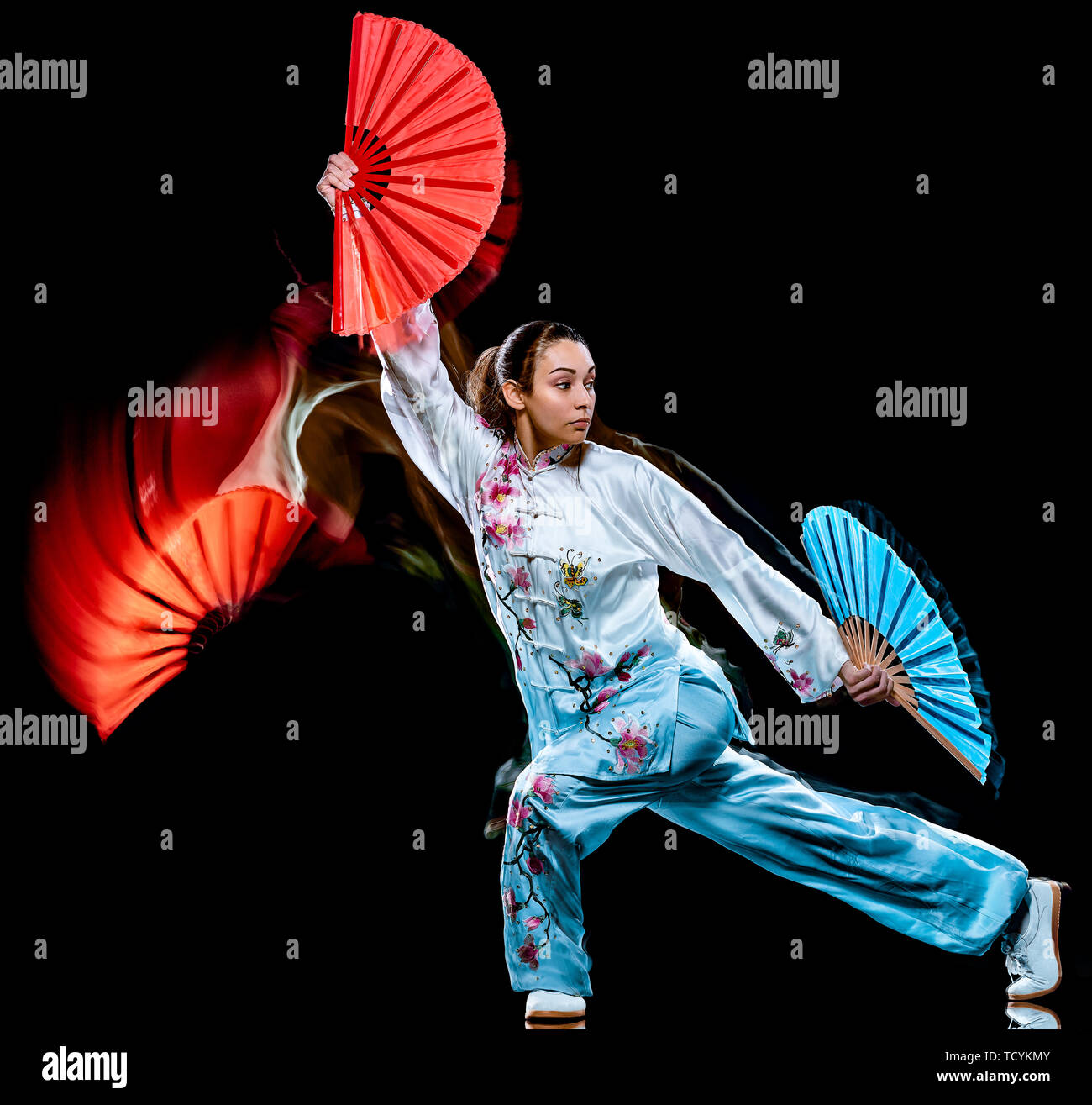 one chinese woman partacticing Tai Chi Chuan Tadjiquan posture studio ...