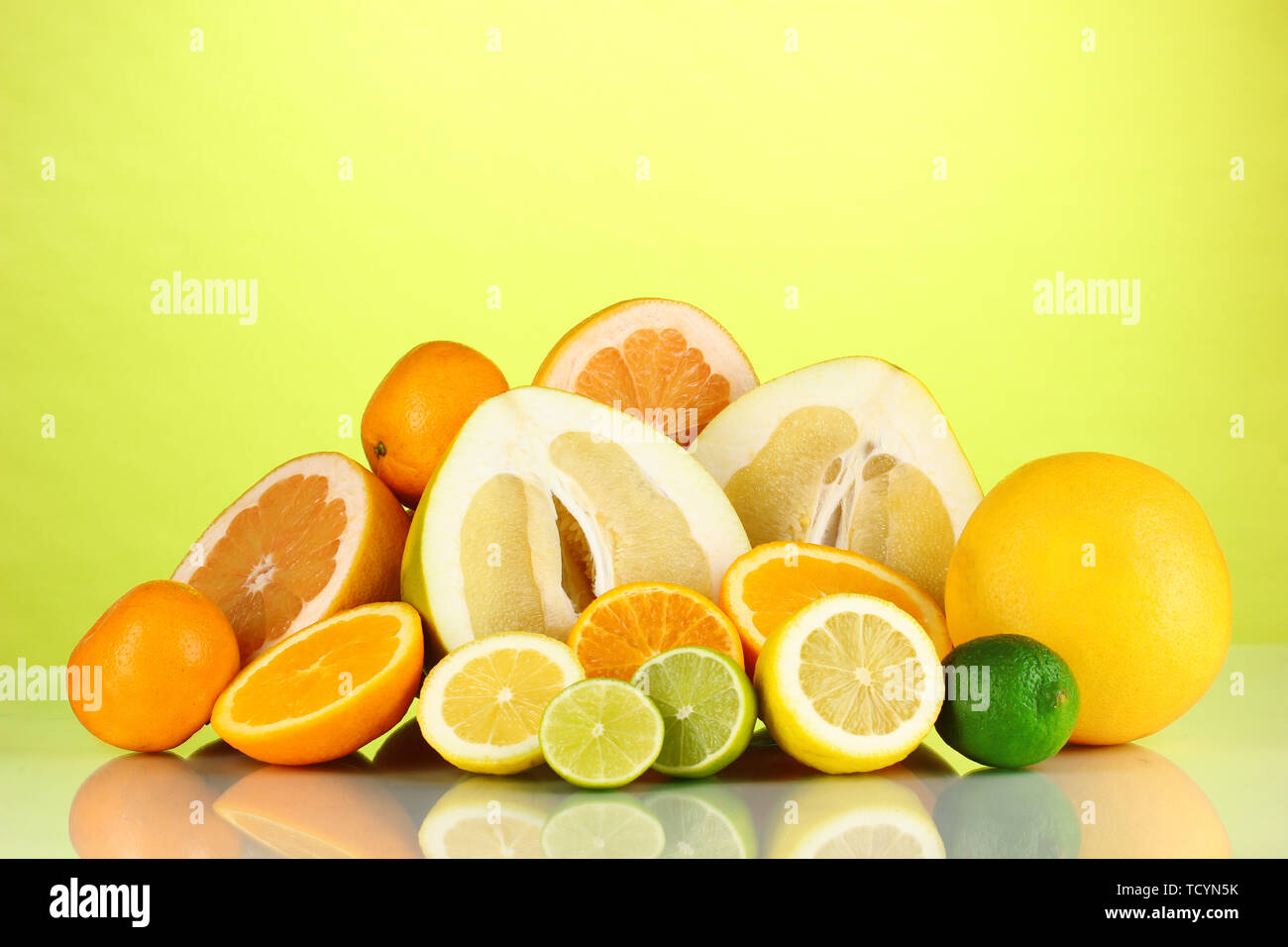 Lots ripe citrus isolated on white Stock Photo - Alamy