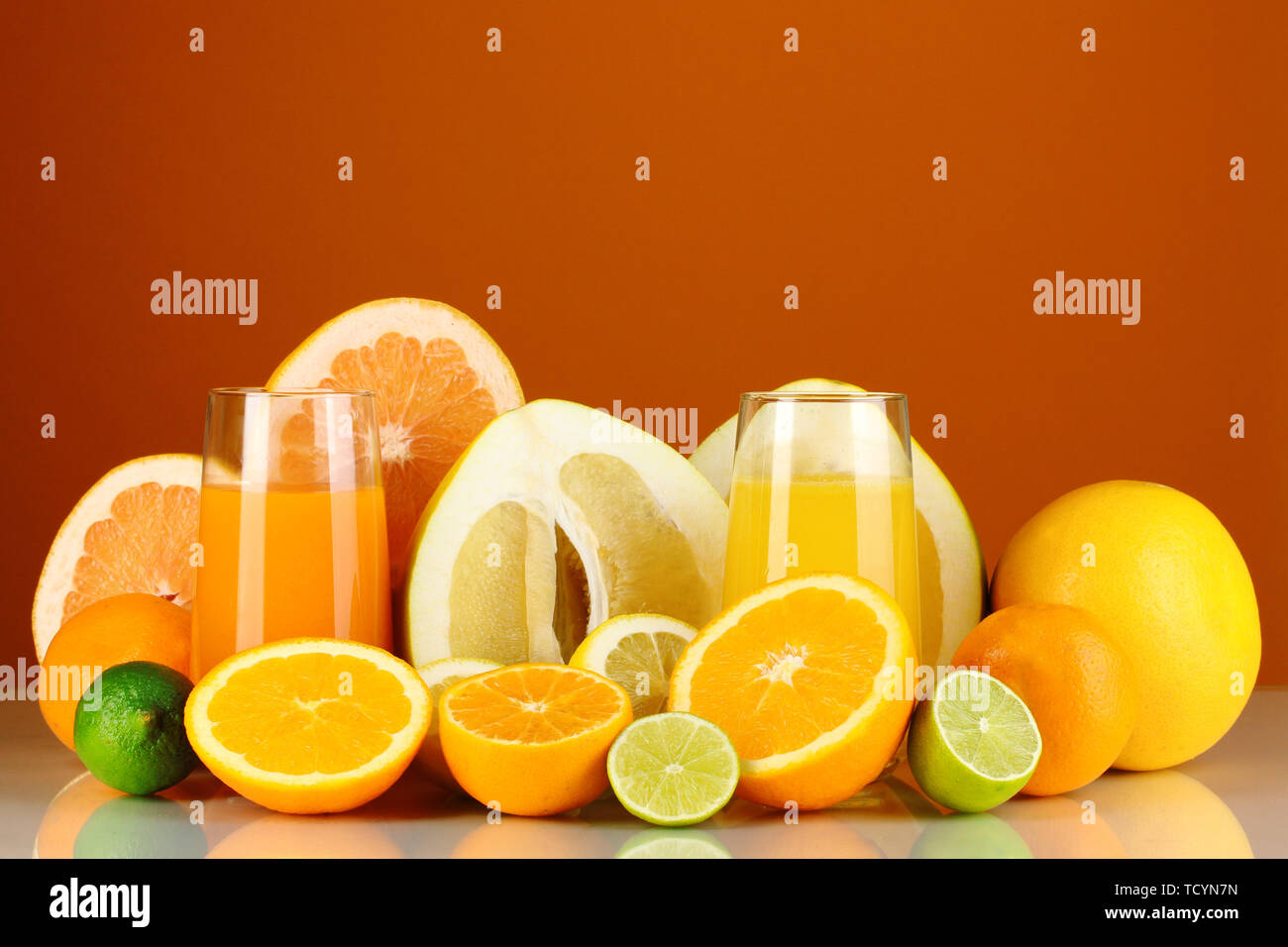 Lots ripe citrus isolated on white Stock Photo - Alamy