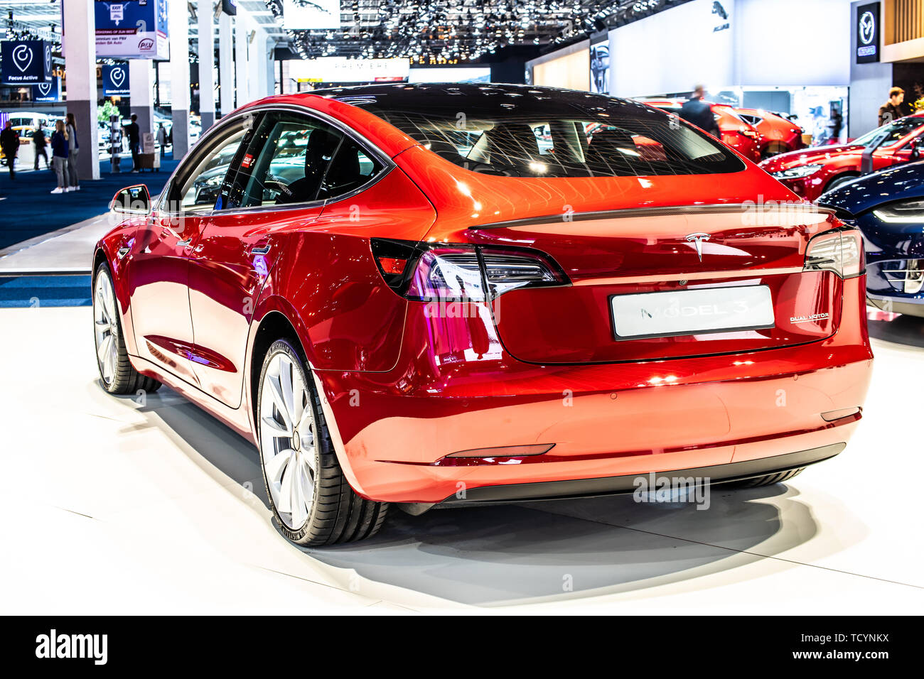 Brussels, Belgium, Jan 22, 2019: metallic red Tesla Model 3 at Brussels ...