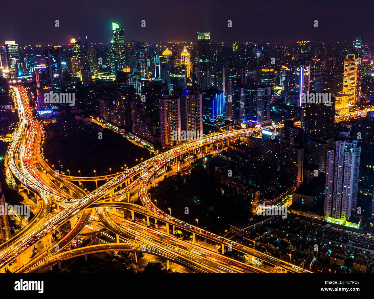 K11 overlooks Shanghai night view --X-shaped overpass Stock Photo - Alamy
