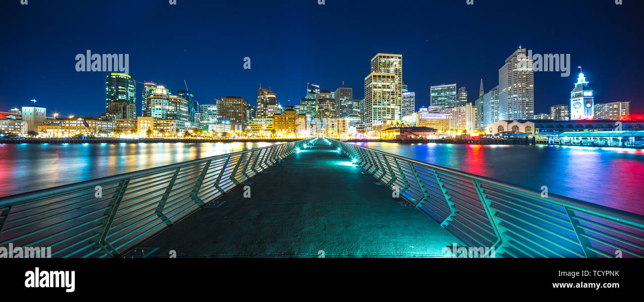 empty footpath over water to modern office buildings in san fran Stock ...