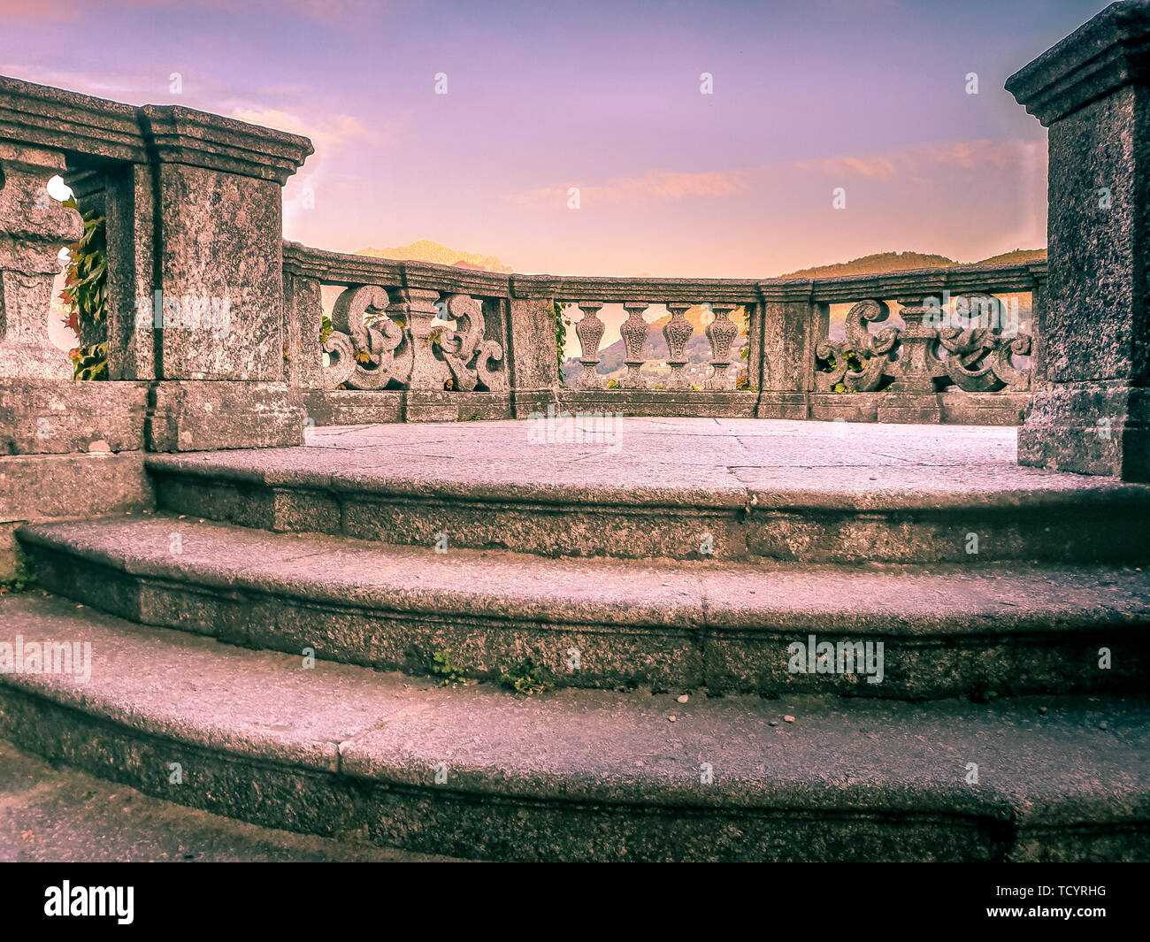 Image of Italian stone balustrade illuminated by sun rays and water in ...